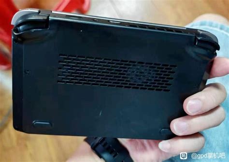 GPD Win Mini Will Be A Small Ish Handheld Gaming PC With A Clamshell Design Liliputing