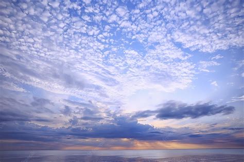 Download White Clouds With Sunset View Horizon Wallpaper