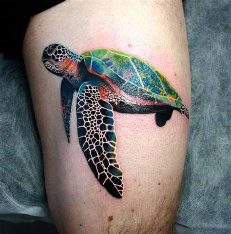 A Colorful Turtle Tattoo On The Thigh