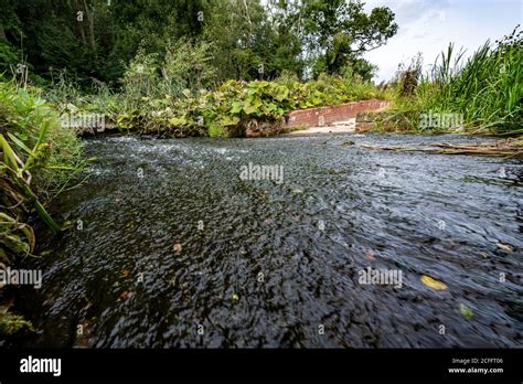 Low Level Image Of Canal Water Running Off Into A Spillway Overflow On The Montgomery Canal In Low Level Image Of Canal Water Running Off Into A Spillway Overflow On The Montgomery Canal In