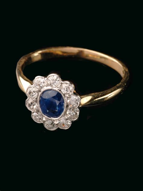 18ct Yellow Gold Sapphire And Diamond Cluster Ring Goodwins