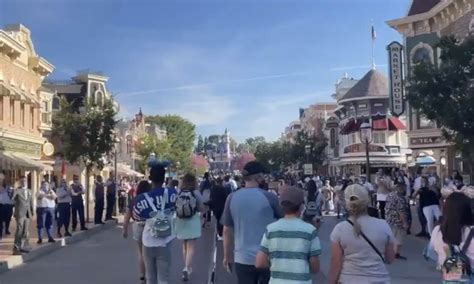 Cast Members Line Main Street Usa To Welcome Guests Back To Disneyland