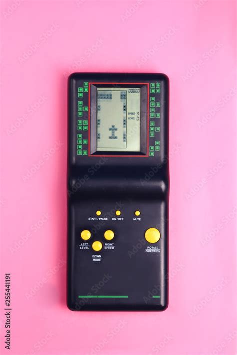 Black Tetris Game Console On Pink Background Retro And Group 80s And