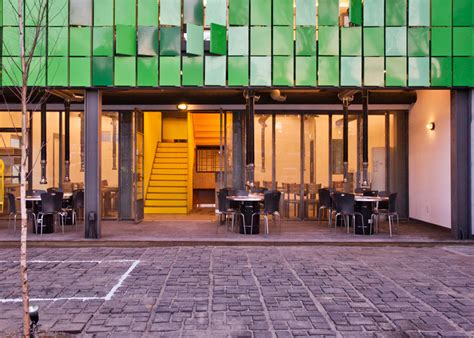 Jya Rchitects Clads Restaurant Facade In Rotating Green Panels