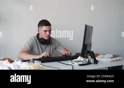 tired developer work fatigue sleepy exhausted drowsy programmer man using computer typing on