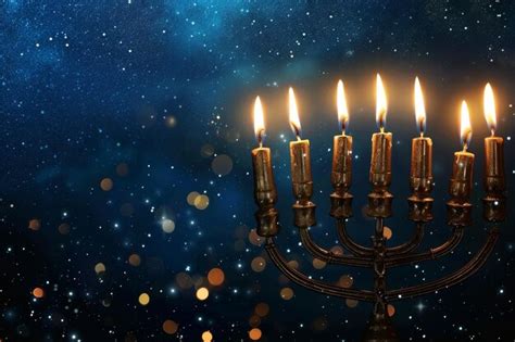 Premium Photo A Lit Menorah With Six Candles On It