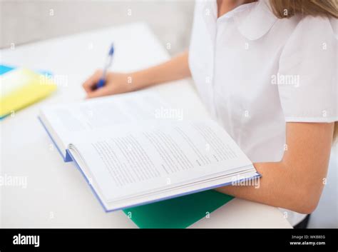 Babe Girl Writing In Notebook At Babe Stock Photo Alamy