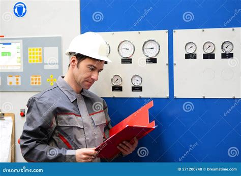 Industrial Workers Inspect The Technology Of A Plant For Function