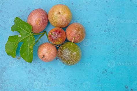 Fresh Organic Passiflora Berries On A Blue Background 53028445 Stock