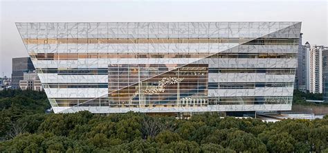 largest library in china is encased in marble printed glass facade
