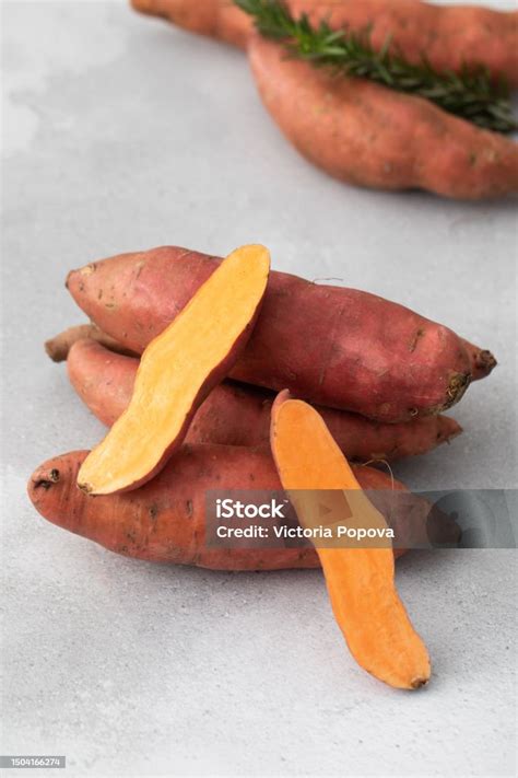 Raw Sweet Potatoes Whole And Cut Orange Kumara Sweet Potato Harvesting