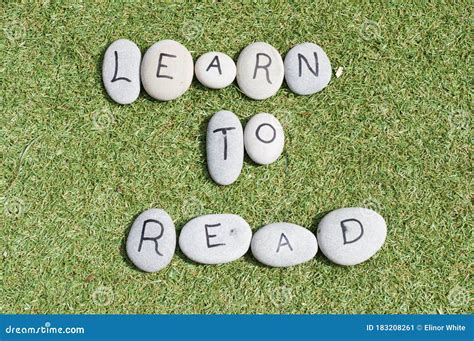 Learn To Read Spelt In Rocks On Artificial Grass Stock Image Image Of