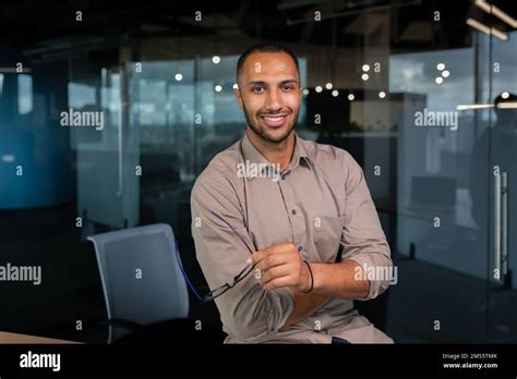 Portrait Of African American Businessman In Office Man In Shirt