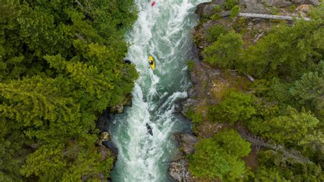 Paddlers Making Their Way Down The Rough Cheakamus River Whistler