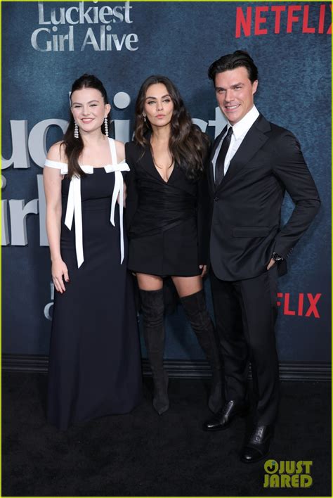 Mila Kunis Wears Black Mini Dress And Thigh High Boots For Luckiest Girl