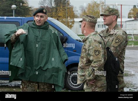 Lt Col Igor Knezevic Land Forces Of Montenegro Explains To Maj Ian Hepburn And Sgt Maj