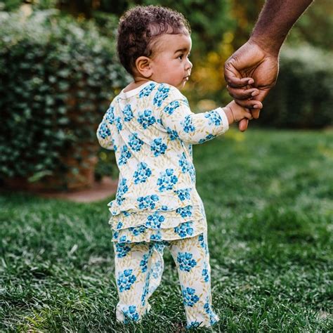 Valais Sheep Bamboo Ruffle Zipper Footed Romper Milkbarn