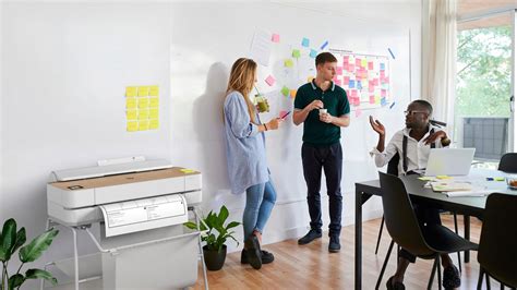 Hps Designjet Studio Is A Printer That Resembles A Piece Of Furniture