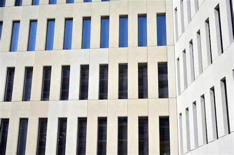 Premium Photo Modern Office Building Detail Perspective View Of Geometric Angular Concrete Windows