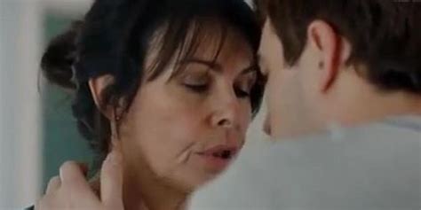 Old Woman Kissing Young Man 1