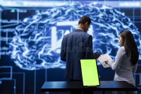 technicians use green screen tablet and ai neural networks to look at
