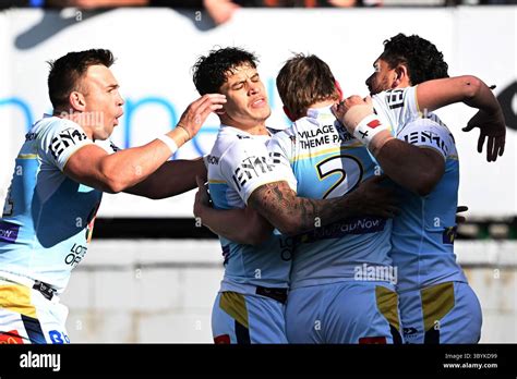 The Titans Celebrate Jaylan De Groots Try During The Nrl Round 20