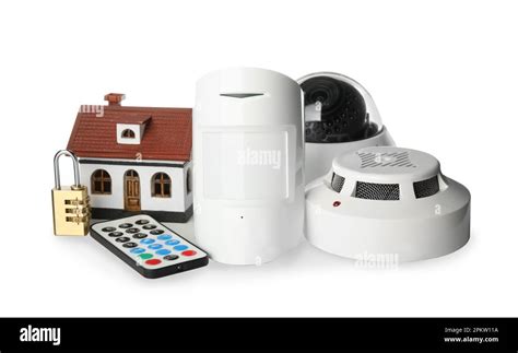 House Model Cctv Camera Remote Control Lock Smoke And Movement Detectors On White Background