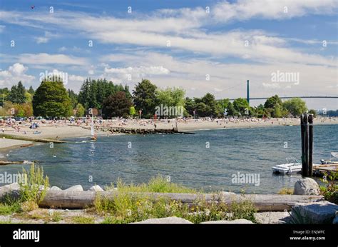 Beachgoers Enjoying The Sunshine At Ambleside Park In West Vancouver