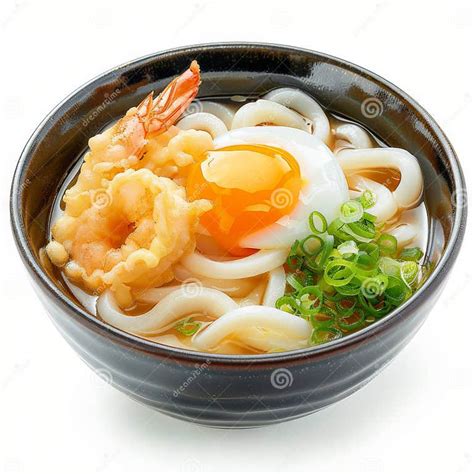 A Bowl Of Japanese Udon Noodles In A Savory Broth With Tempura Shrimp