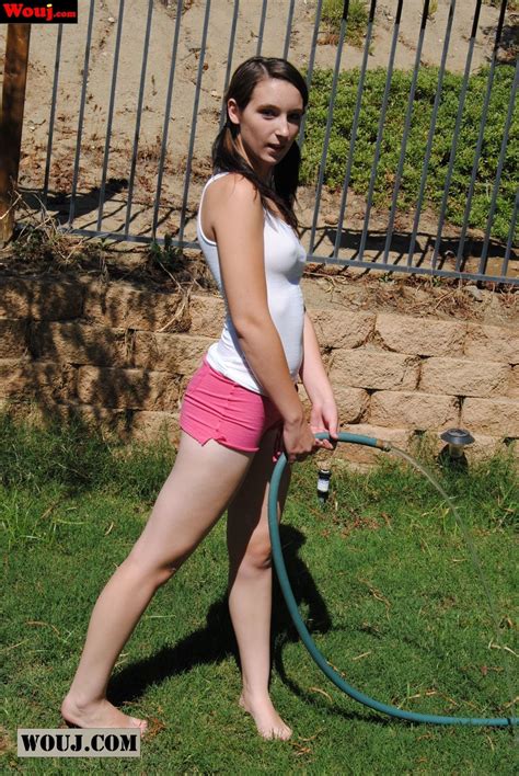 Smoking Hot Brunette Girl Teasing With Her Wet Body Outdoors 15 Photos