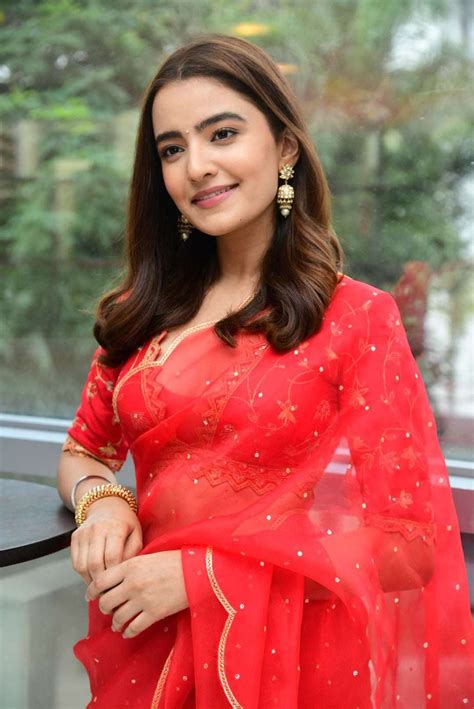 Rukshar Dhillon Sparkles In A Red Organza Saree At A Movie Trailer Launch