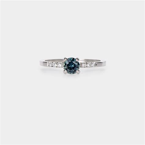 Sapphire Solitaire Ring 055ct Round Sapphire James And Irisa
