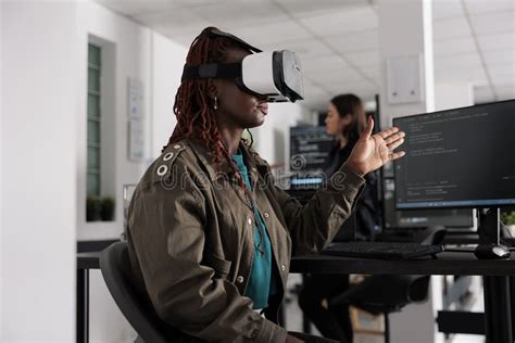 It Programmer Working With Virtual Reality Headset To Develop Server App In It Big Data Office
