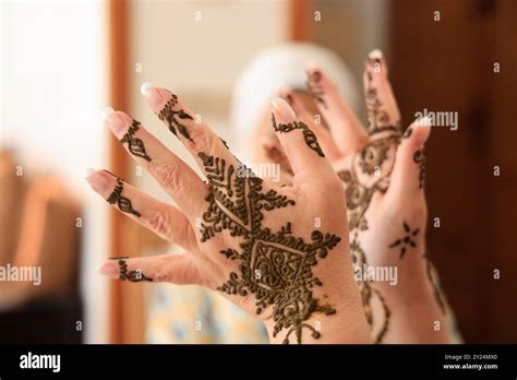 Temporary Tattoo Of Womans Hands With Henna In The Marrakech Region Of