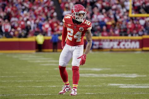 Download Kansas City Chiefs Player On Field Wallpaper