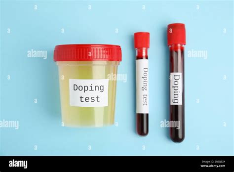 Jar And Test Tubes With Samples On Light Blue Background Flat Lay