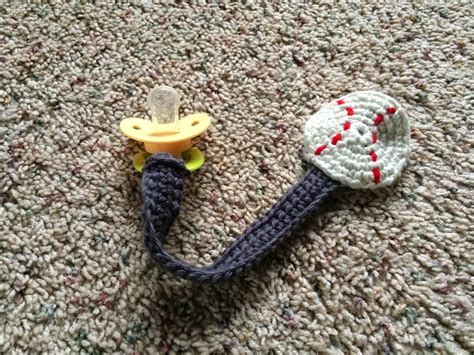 Grey Walls Blue Couch Crochet Pacifier Clip Pattern