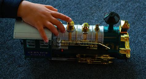 The Girl Is Playing With A Plastic Train Stock Image Image Of Nursery Game 259518535