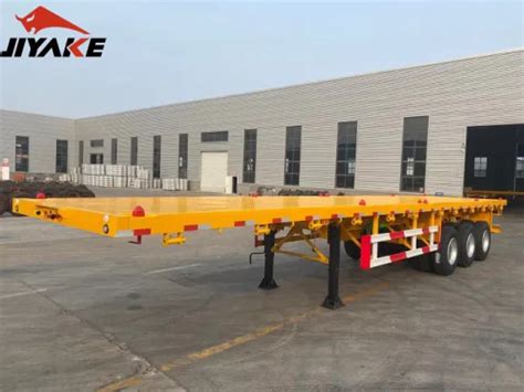 3 Axle Heavy Duty 40ft Flatbed Platform Drop Deck Utility Cargo Container Chassis Truck Semi