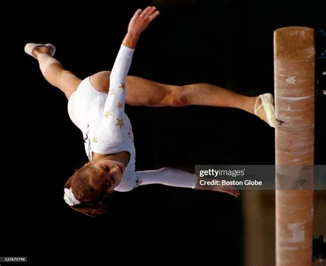 U S Gymnast Dominique Moceanu Almost Falls Of The Balance Beam While