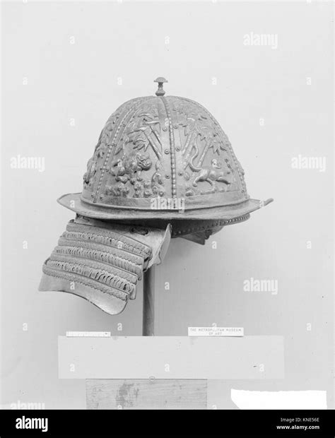 A Historical Helmet Demonstrates Military Armor Design And Protective Qualities Reflecting The