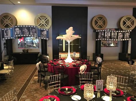 Rat Pack Film Reels And Feather Tower Centerpieces Rat Pack Party