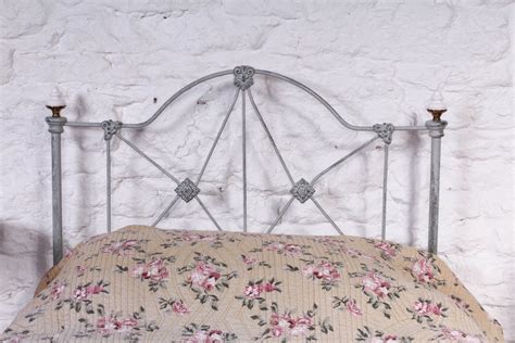 Pretty Hand Finished Single Iron Bed With Porcelain Knobs
