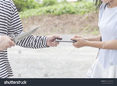 Someone Stealing A Phone