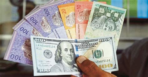 Ringgit Opens Slightly Lower Against Us Dollar New Straits Times