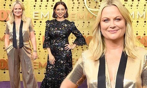 Amy Poehler Is Golden In Plunging Jumpsuit While Maya Rudolph Is