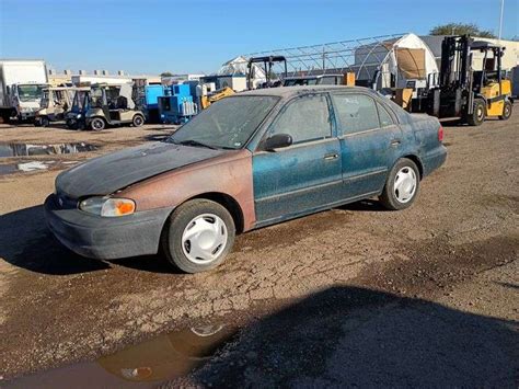 1999 Chevrolet Prizm Sierra Auction Management Inc