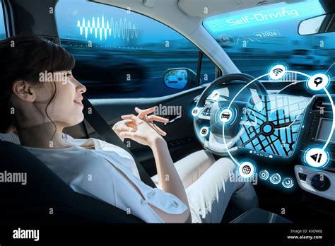 Relaxed Woman In Autonomous Car Self Driving Vehicle Autopilot Automotive Technology Stock