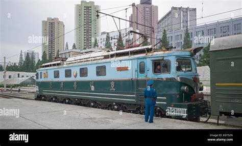Red Flag 1 Class Electric Locomotive No 5048 At Head Of Passenger