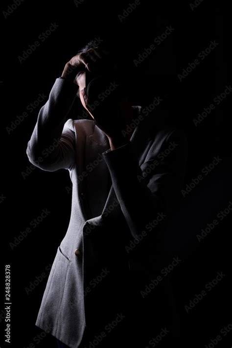 Asian Woman Photographer Hold Camera With External Flash Point To Shoot